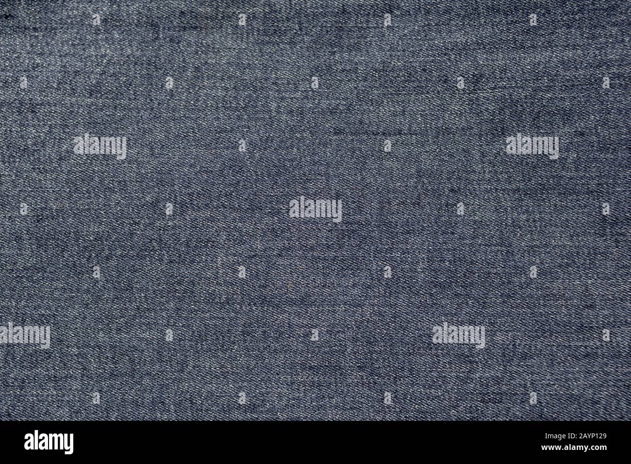 Textured background of washed blue denim fabric Stock Photo - Alamy