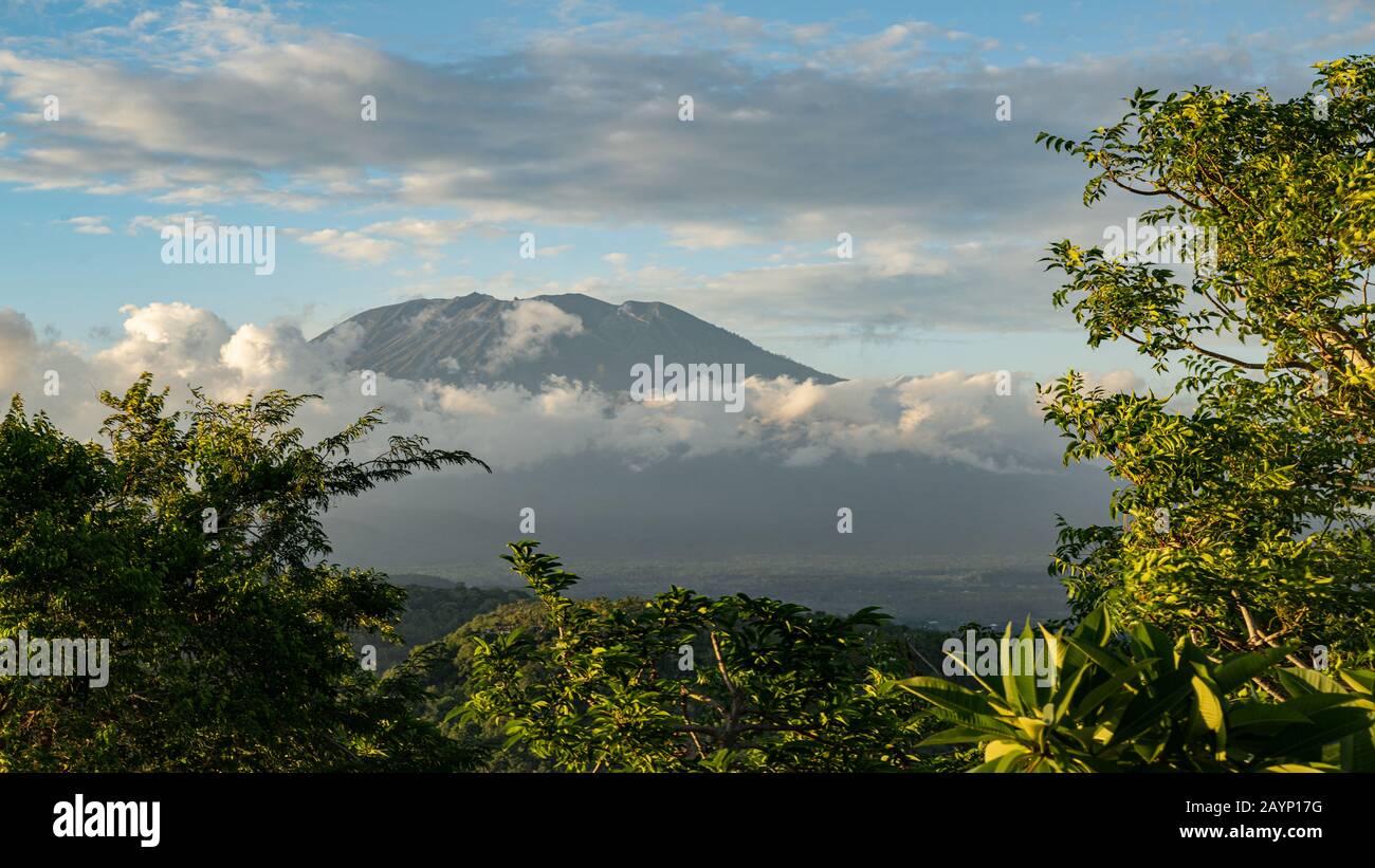 Dormant volcano surrounded by clouds stock photo Stock Photo - Alamy