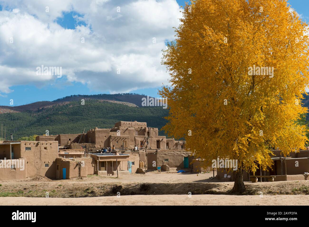 Trees with fall colors at the Taos Pueblo which is the only living ...