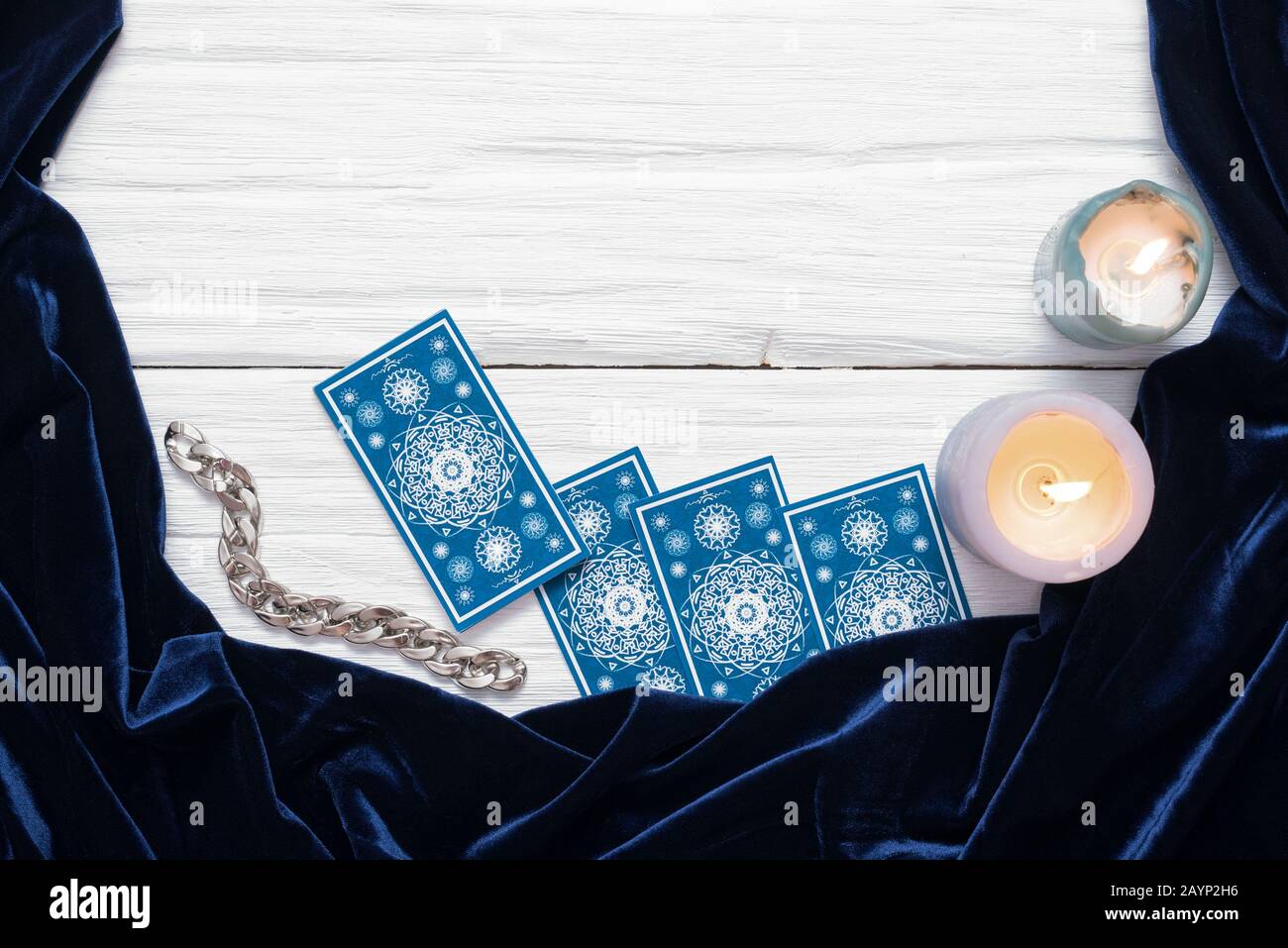 Blue tarot cards on white table background with copy space Stock Photo ...