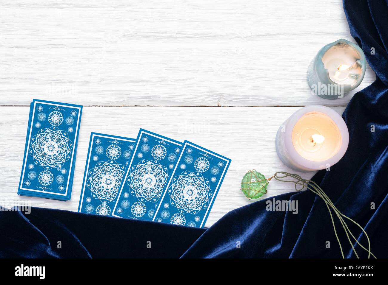 Blue tarot cards on white table background with copy space Stock Photo ...