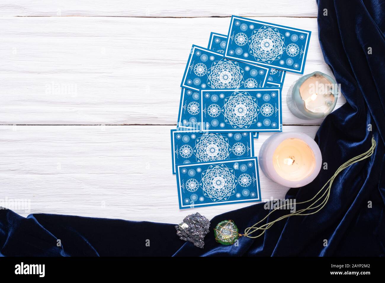 Blue tarot cards on white table background with copy space Stock Photo ...