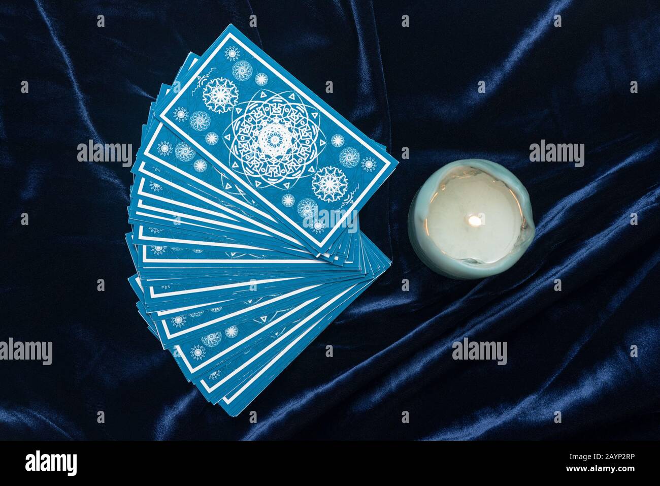 Blue tarot cards on blue velvet cloth background Stock Photo - Alamy