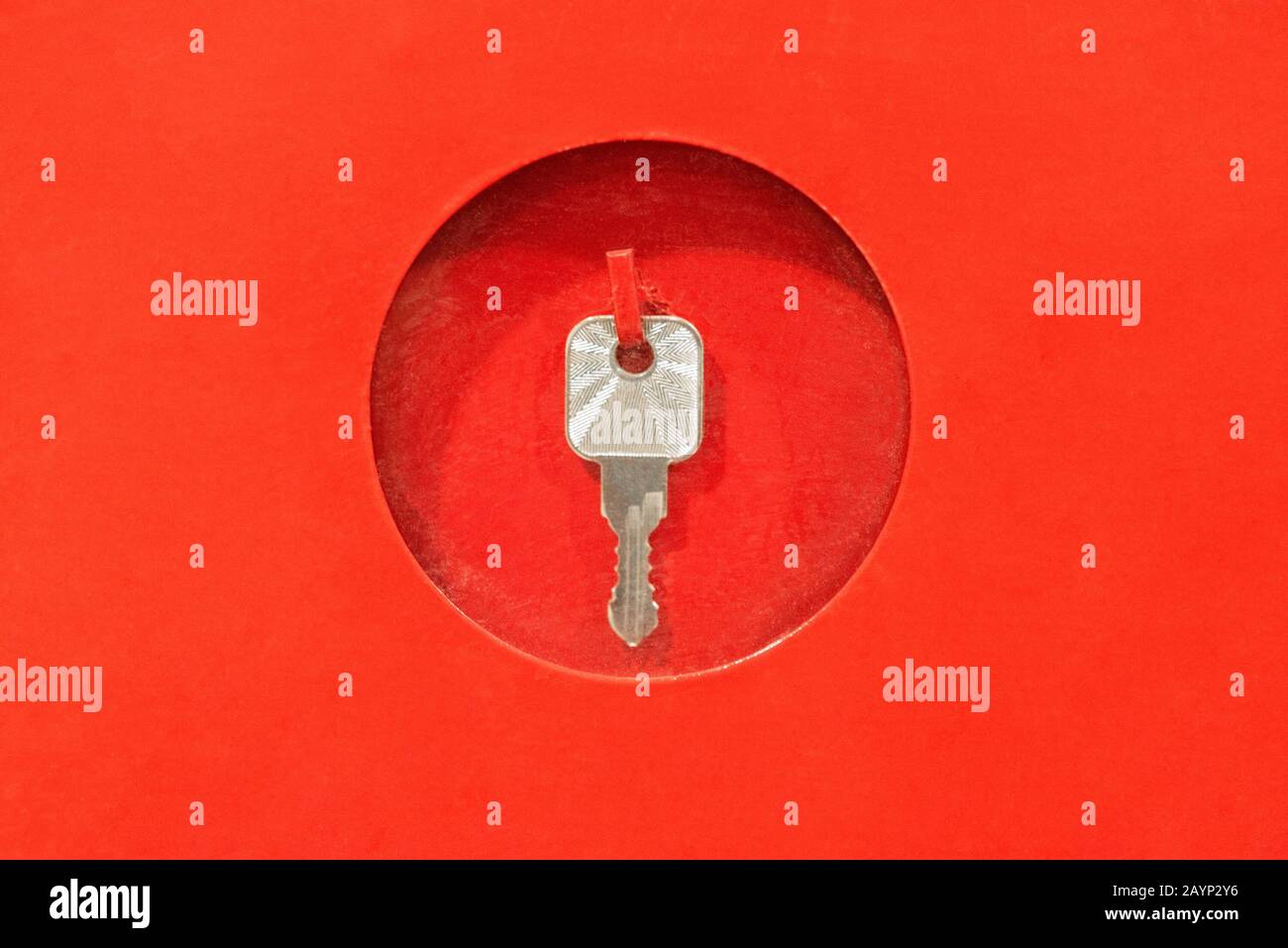 Fire key in red fire fighting case background Stock Photo - Alamy