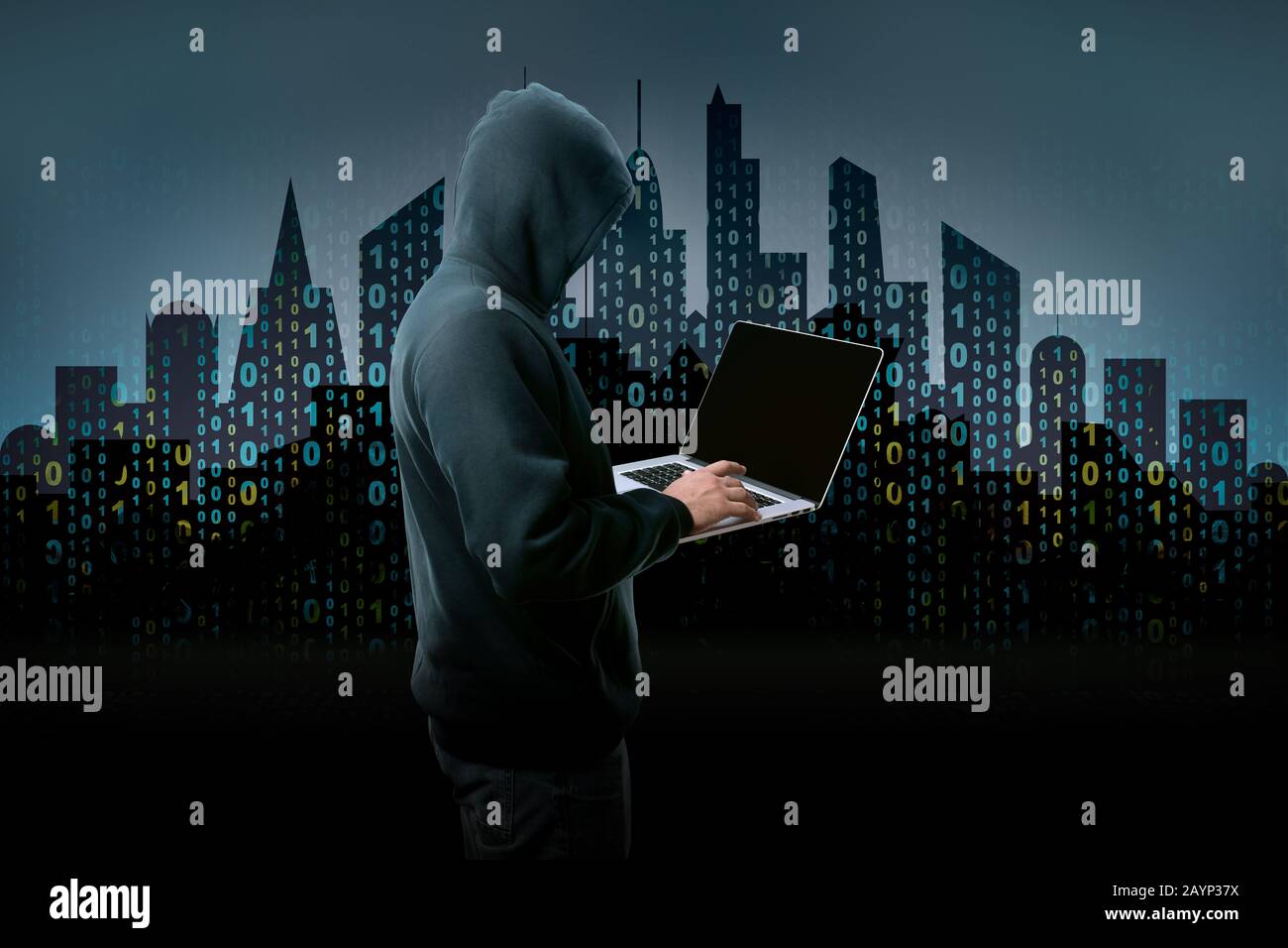 unknown hacker in the hood with laptop over background of city ...