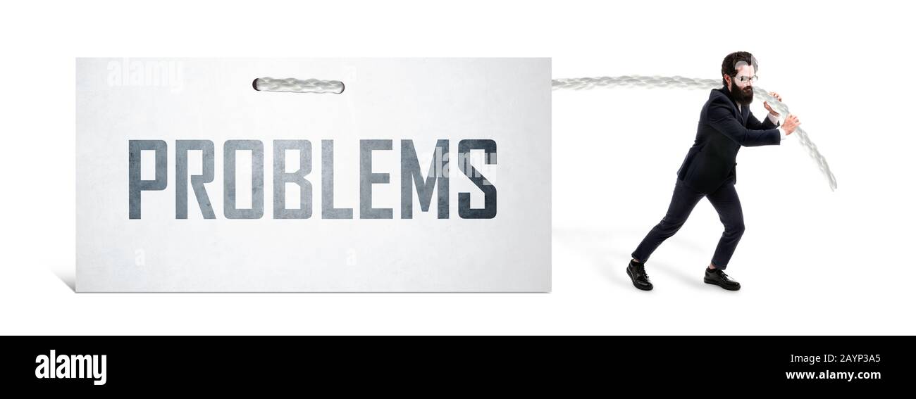 man pulling a heavy problems, inscription on white sheet, panoramic ...