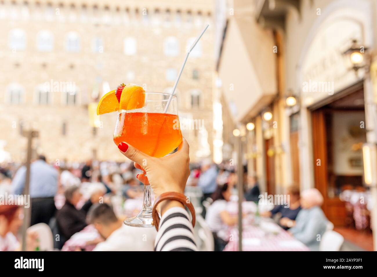 Aperol spritz cocktail decorated with orange and strawberry Stock Photo ...