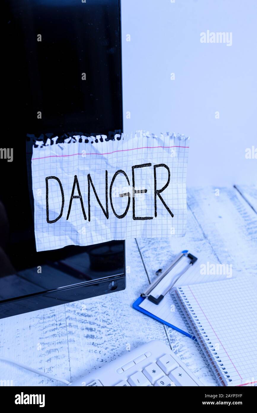 Handwriting text Danger. Conceptual photo the possibility of something ...