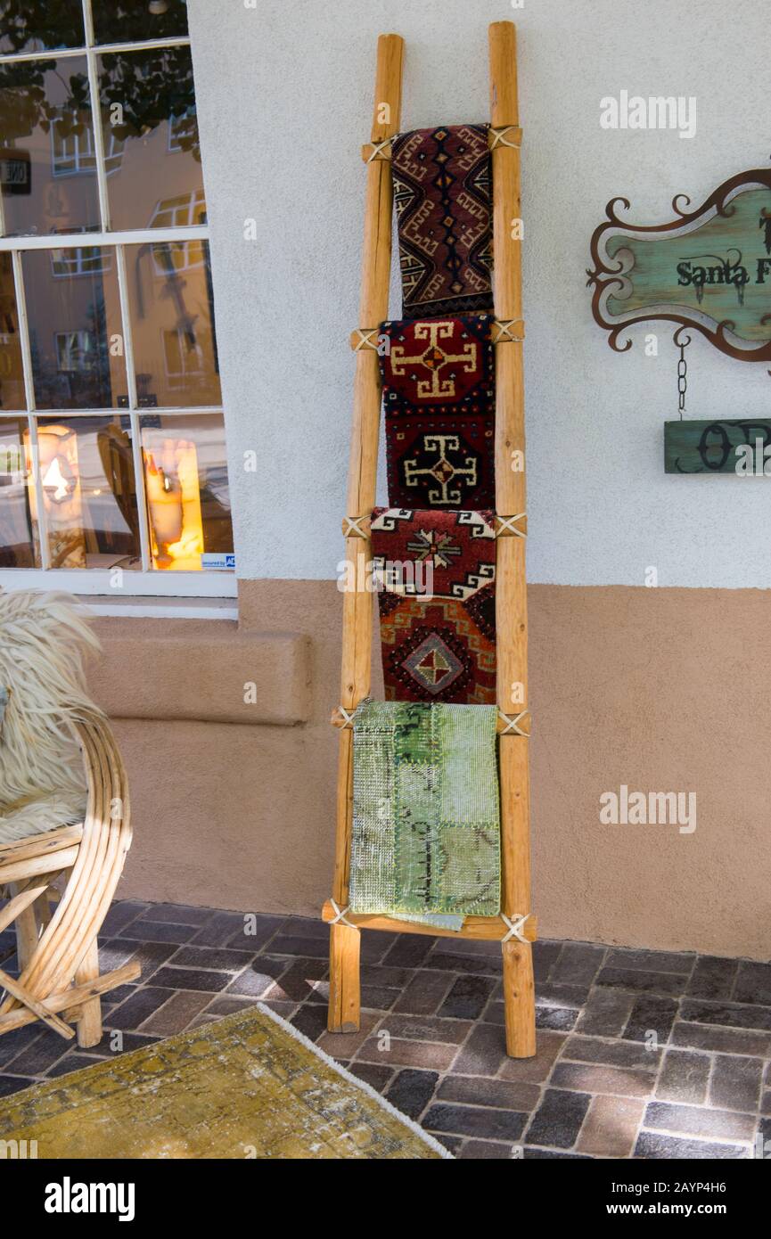 A ladder with weavings in downtown Santa Fe, New Mexico Stock Photo - Alamy