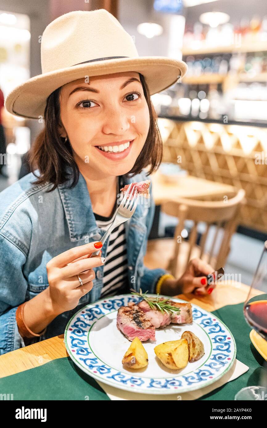 Woman eating roast beef hi-res stock photography and images - Alamy