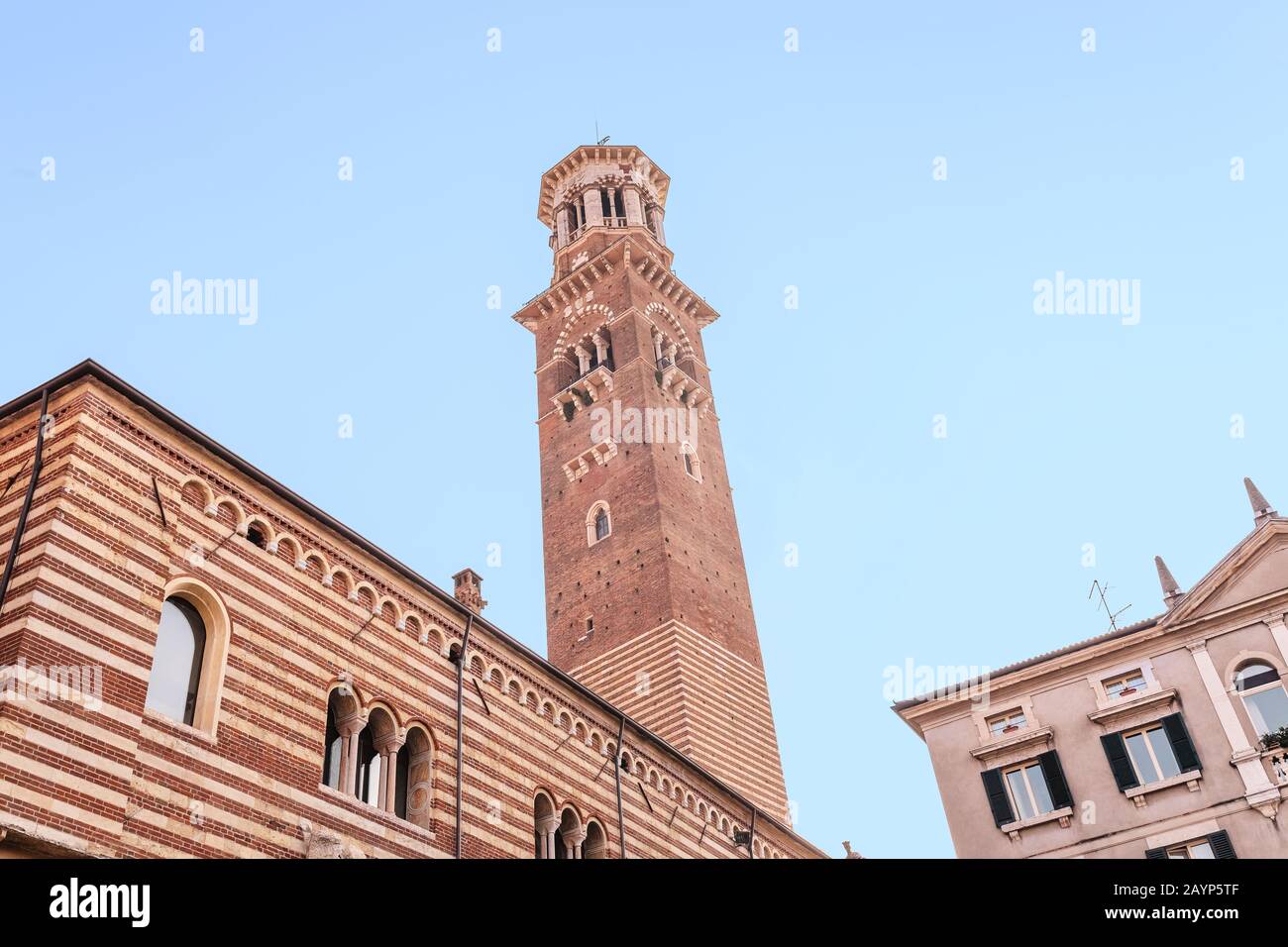 Verona old town square with view of Lamberti tower, tourist destination ...