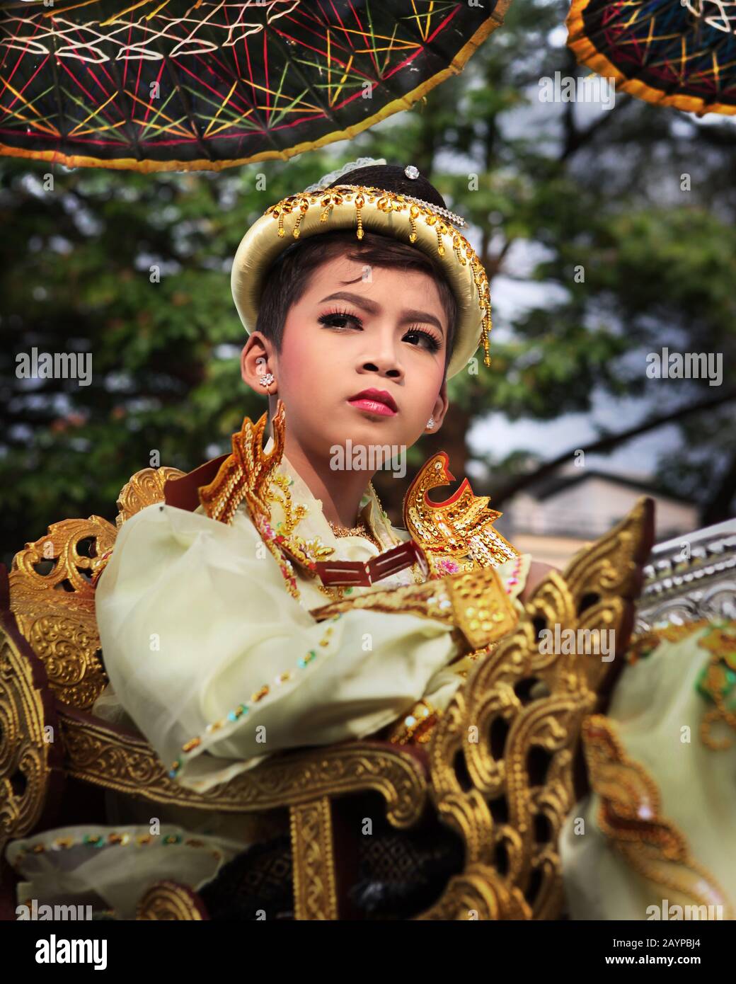A boy in silk garments during Shin Pyu Ceremony one of the most ...