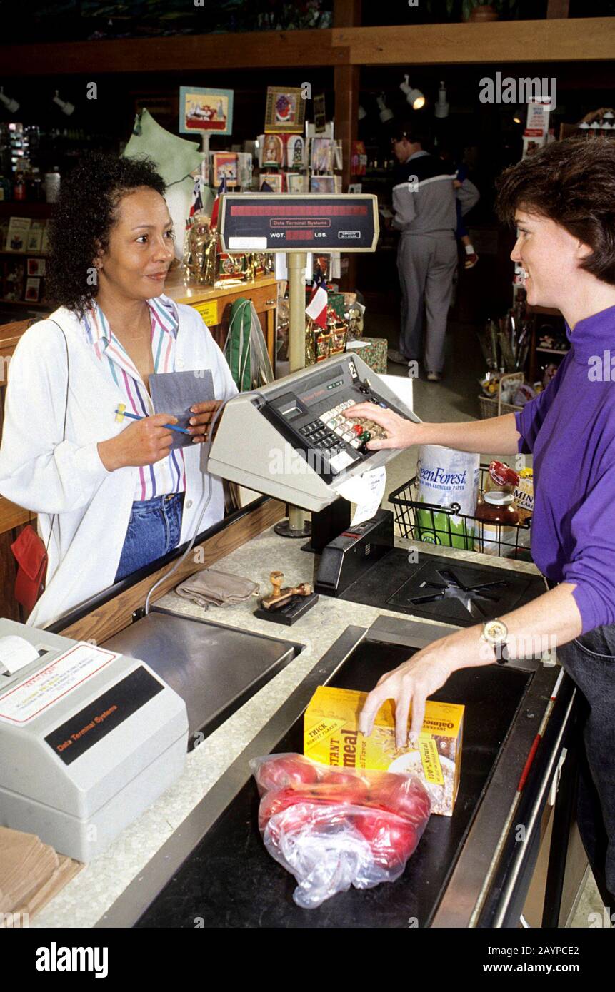 Austin, Texas USA: Black woman at grocery store check-out line. ©Bob ...