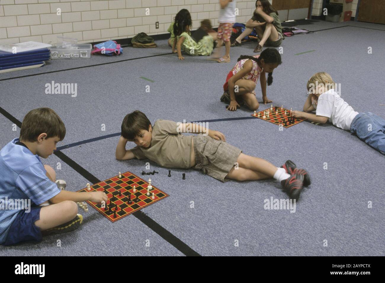 Austin, Texas: Elementary school students play chess during an after ...