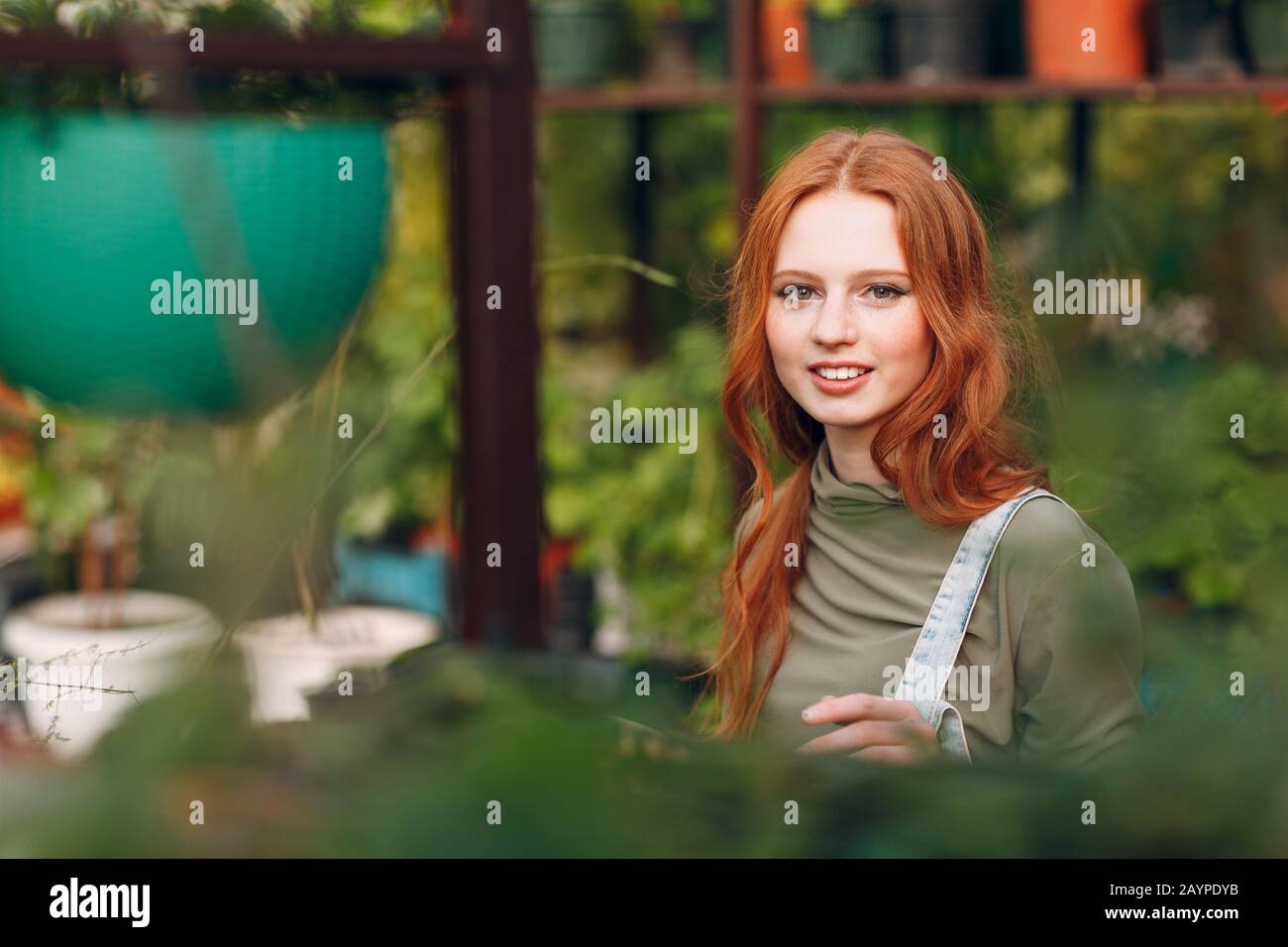 Home gardening concept. Young pretty woman gardener portrait. Spring ...