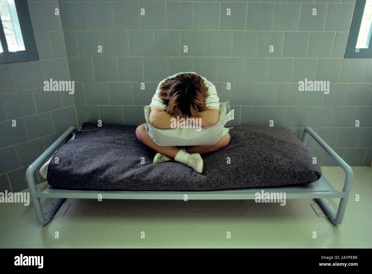 Austin, Texas: Inmate (model) in juvenile detention center cell. ©Bob ...