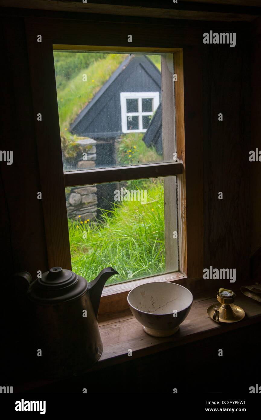 Interior with a window in a traditional turf house at the Skogar folk ...