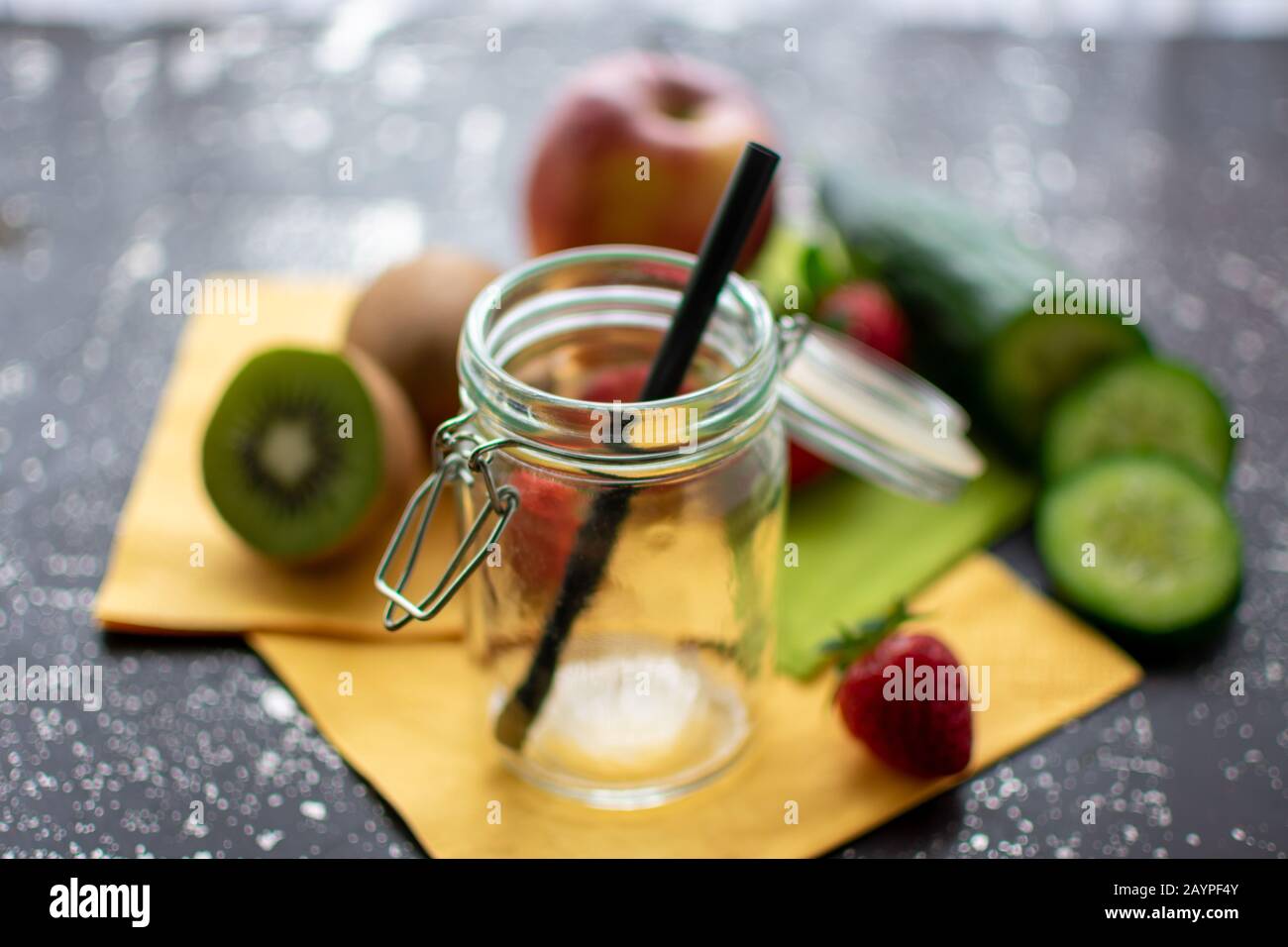 empty preserving jar in close-up. Fresh fruit and vegetables in the ...