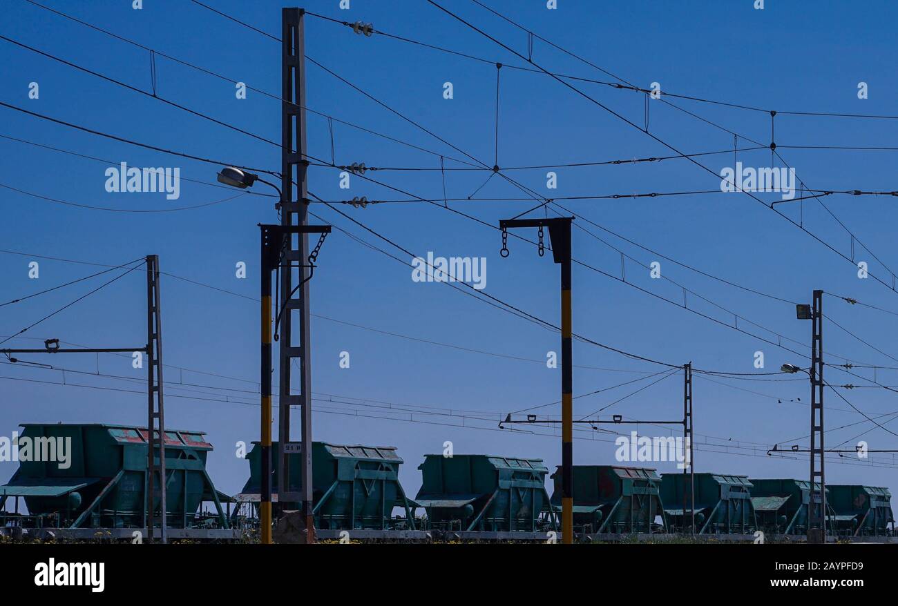 Freight Train With Cargo Containers with blue sky background and ...
