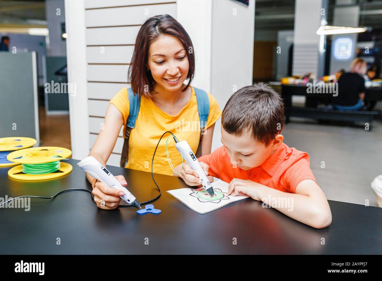 Creative boy with 3d pen learning to draw Stock Photo - Alamy
