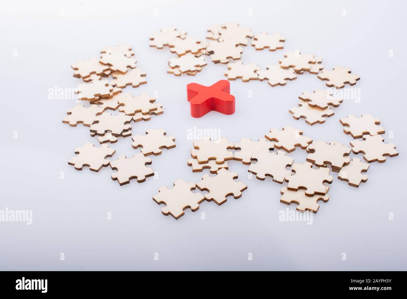 Pieces of jigsaw puzzle around x as problem solution business concept ...