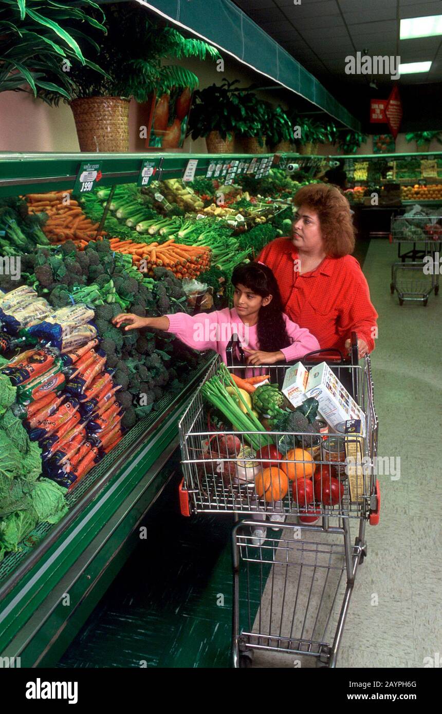 Austin, Texas: Hispanic mother and daughter shopping at health food ...