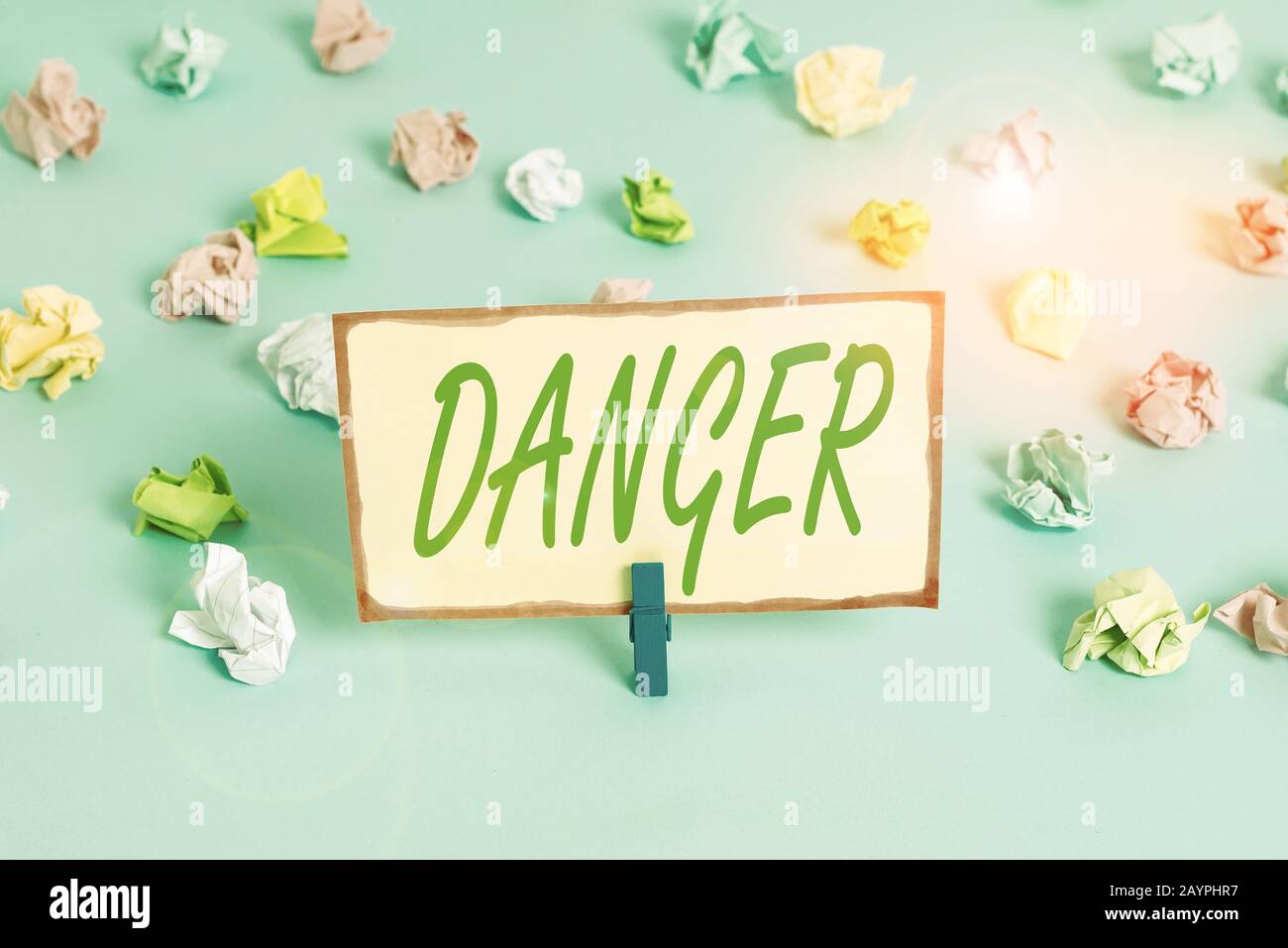 Writing note showing Danger. Business concept for the possibility of ...