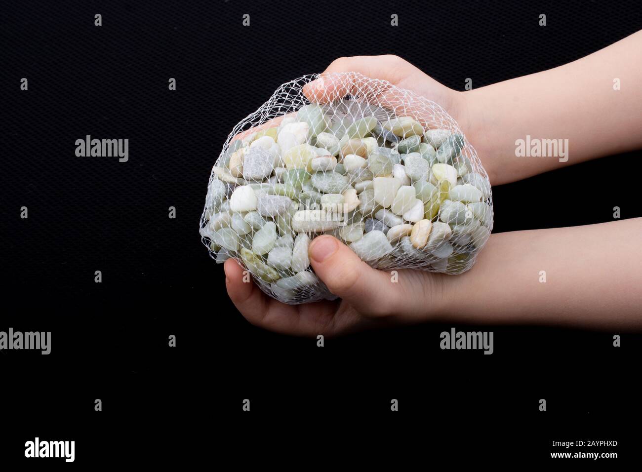 Sand stones hands closeup hi-res stock photography and images - Alamy