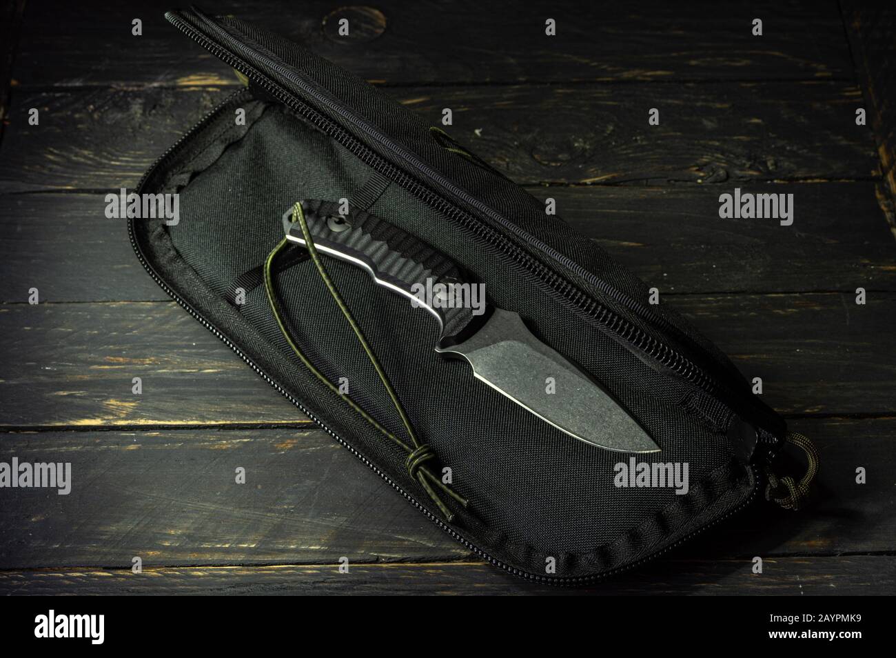 Knife inside the clutch. The knife inside the bag. Top Stock Photo - Alamy