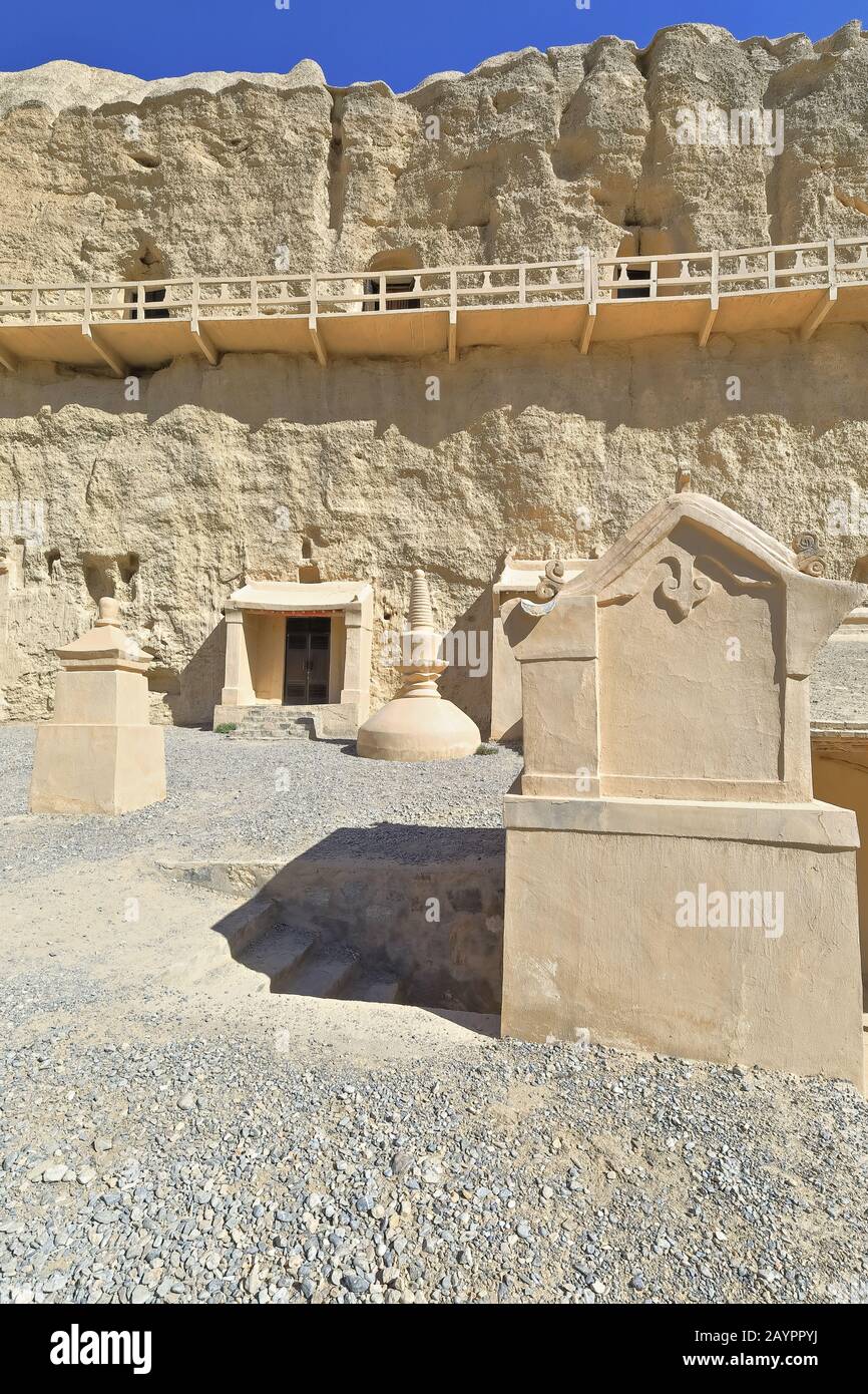 Yulin caves facade-plank path along the cliff. Guazhou county-Gansu ...