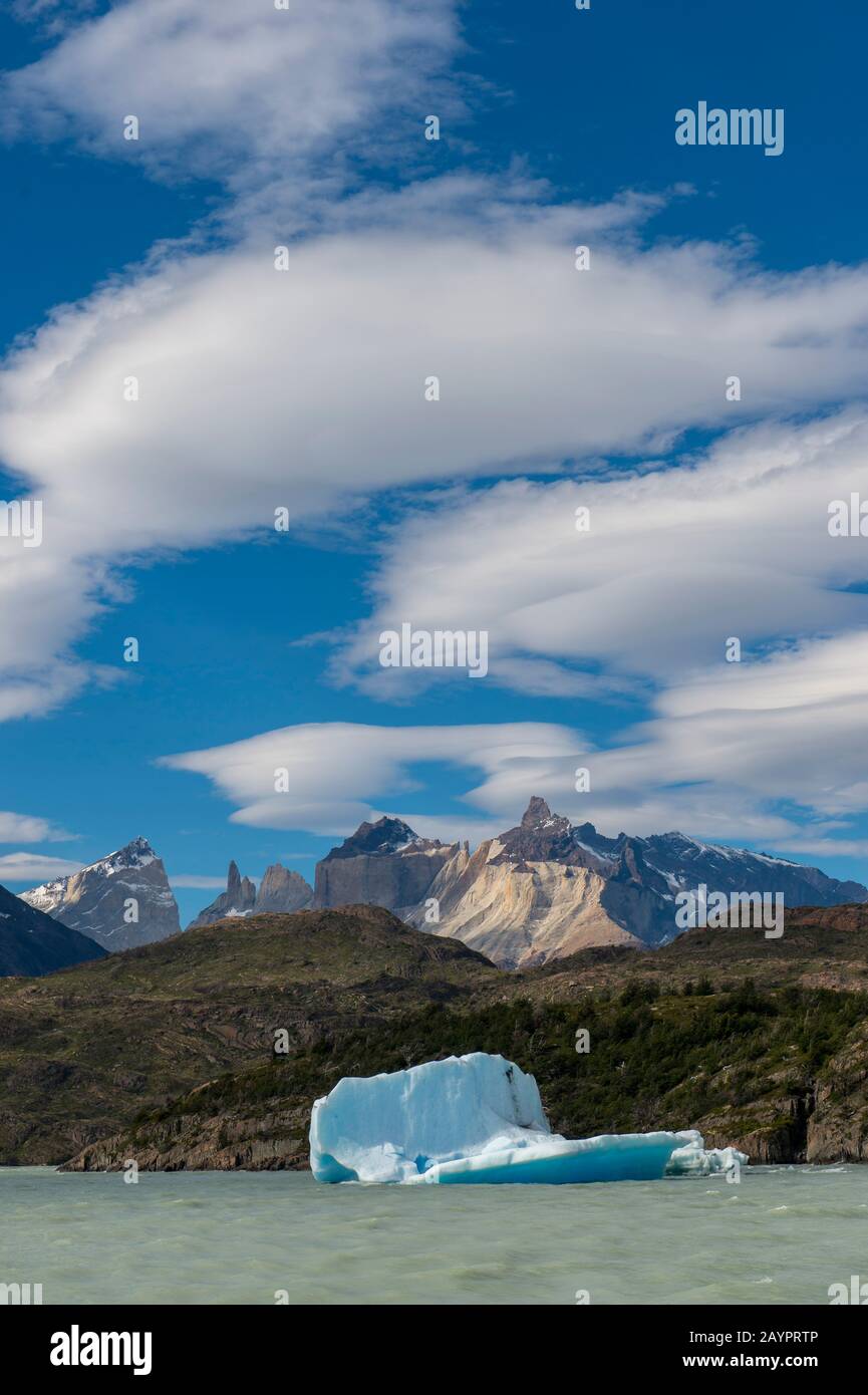 An iceberg is floating in Grey Lake (Lago Grey) in Torres del Paine ...