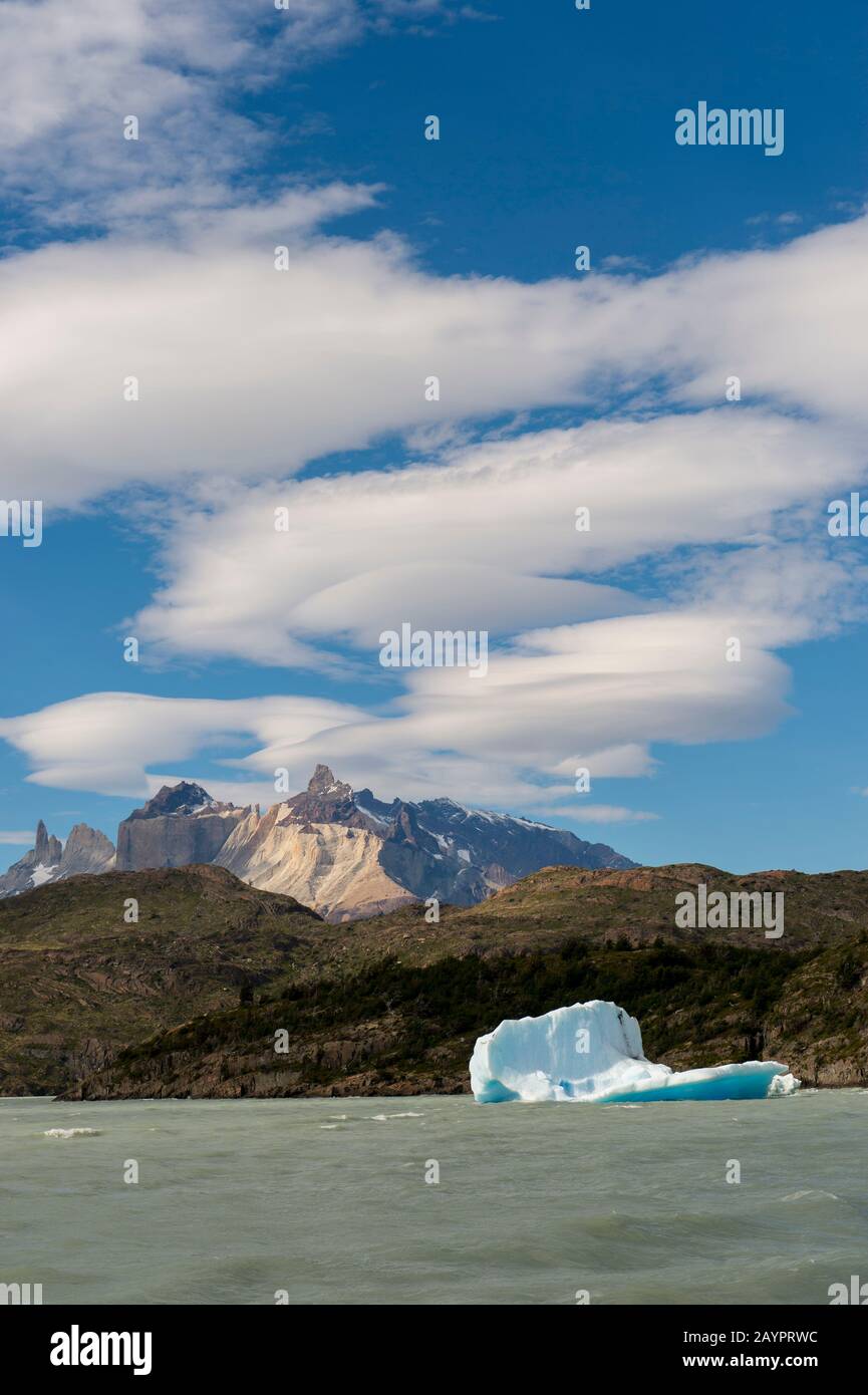 An iceberg is floating in Grey Lake (Lago Grey) in Torres del Paine ...