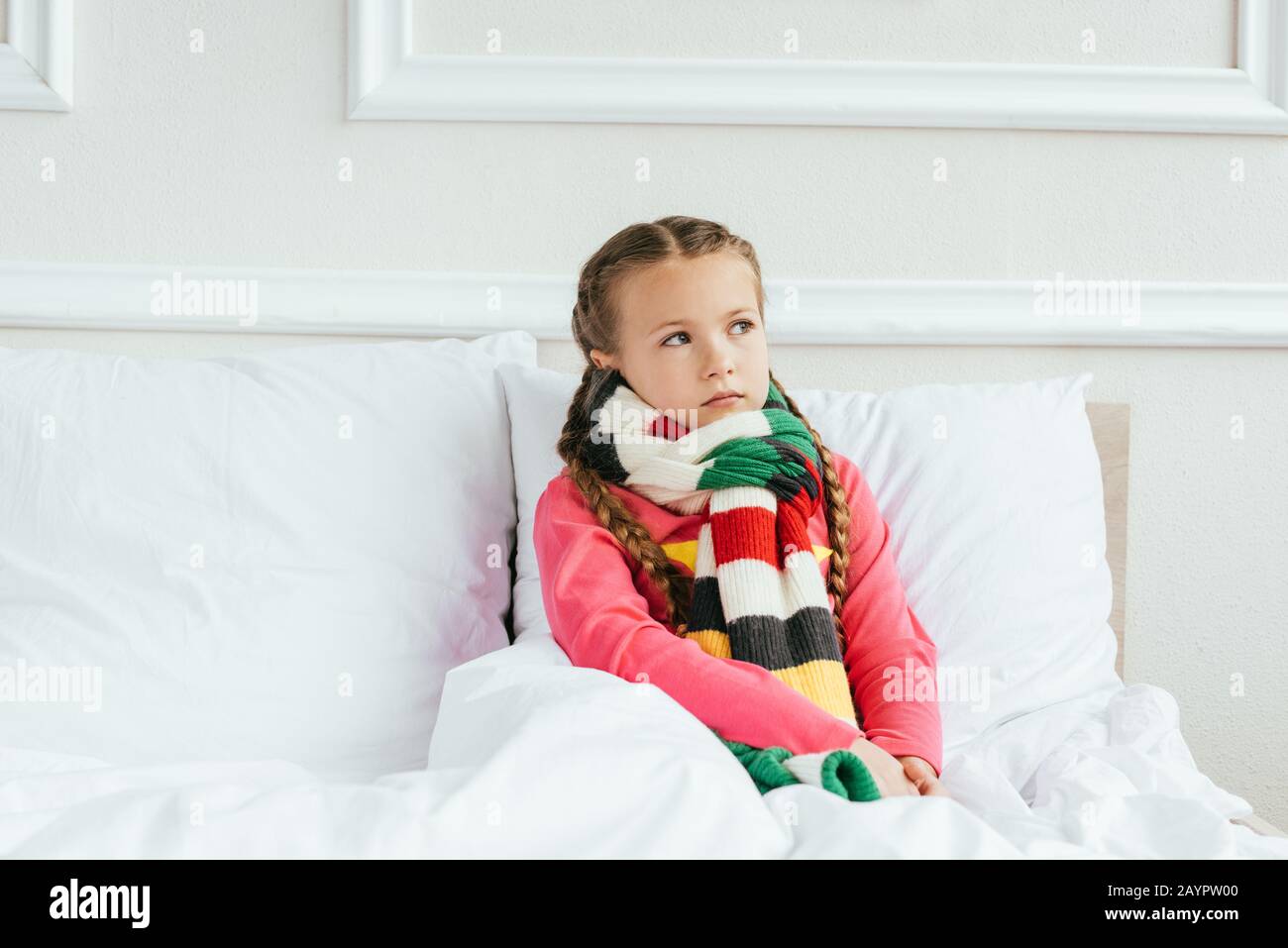 sad diseased child in scarf sitting on bed Stock Photo - Alamy