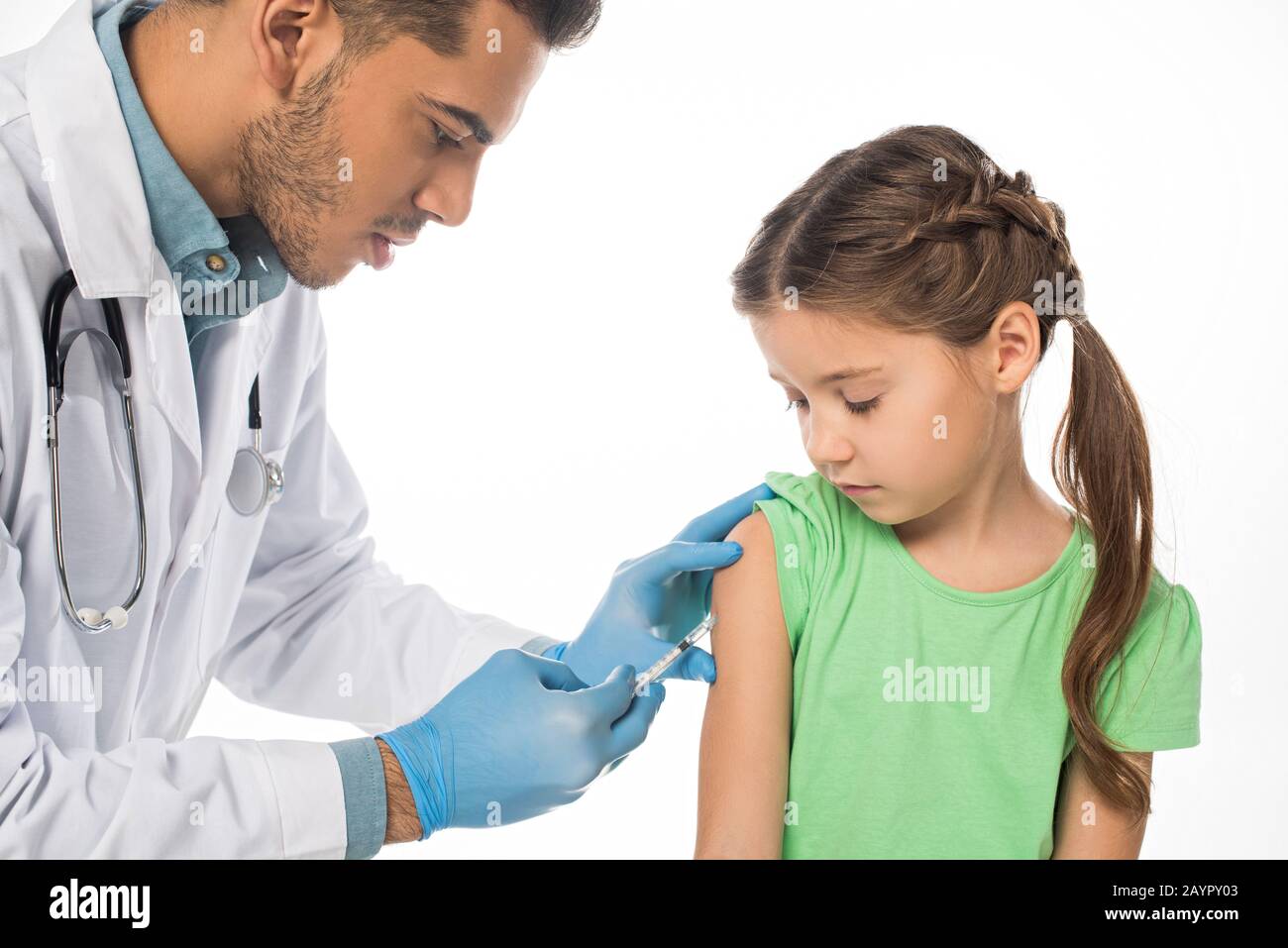 Pediatrician doing vaccine injection to child isolated on white Stock ...