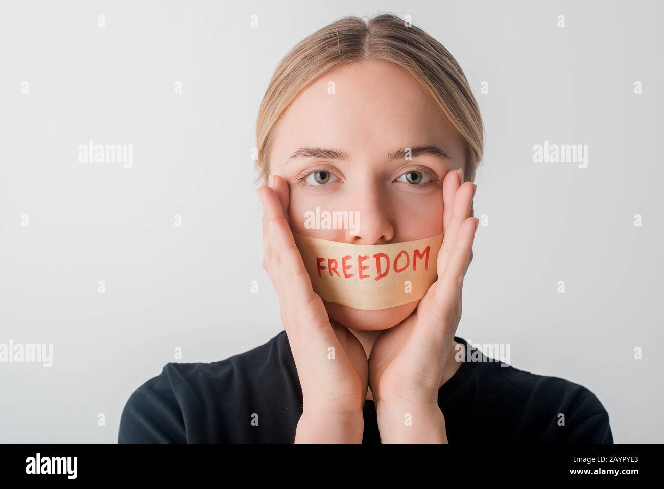 woman with scotch tape on mouth with freedom lettering isolated on ...