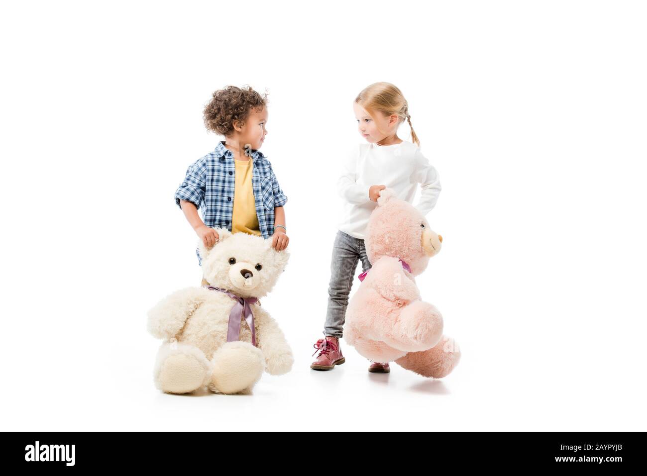 cute multicultural kids holding teddy bears, on white Stock Photo - Alamy