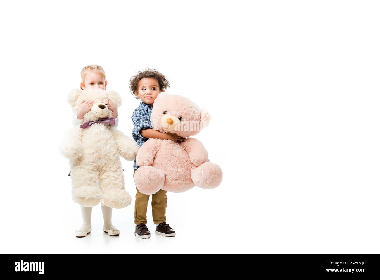 adorable multicultural kids holding teddy bears, isolated on white ...