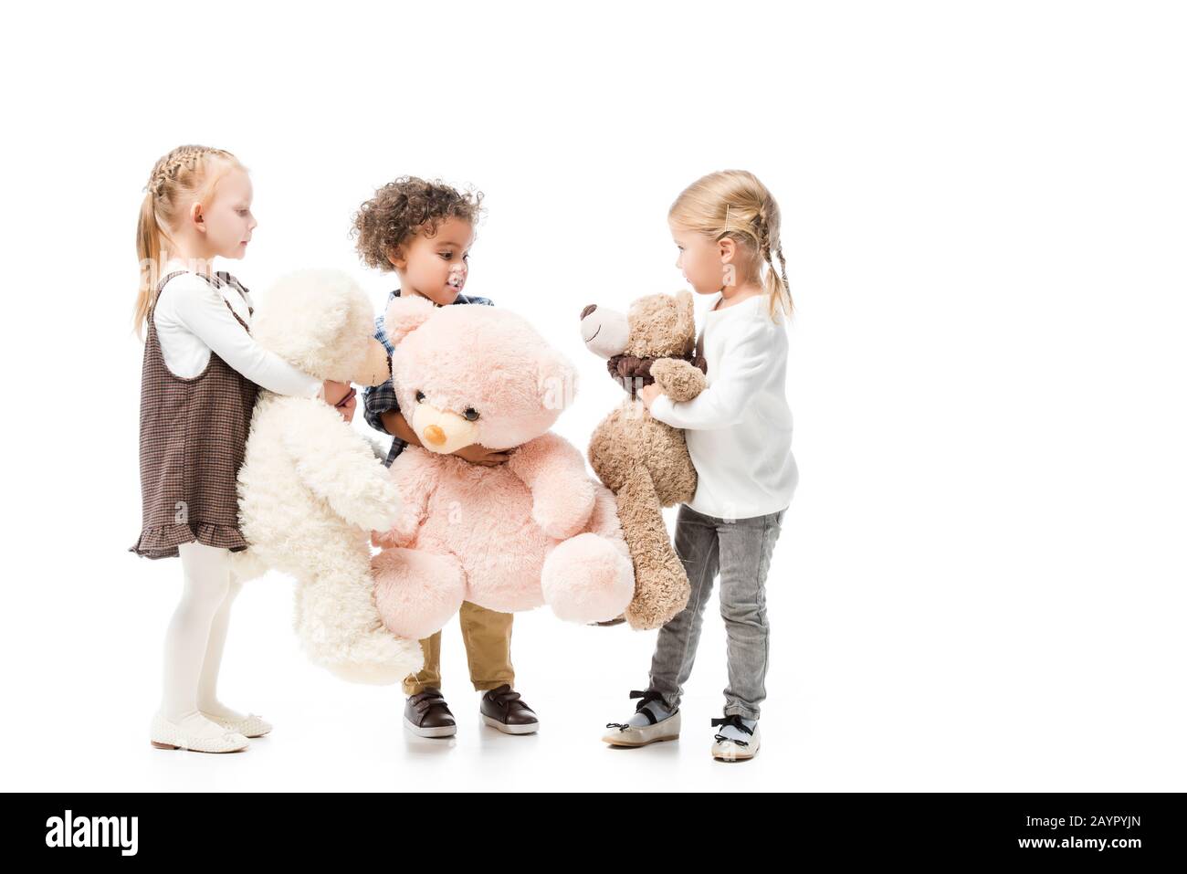 adorable multicultural children holding teddy bears, isolated on white ...