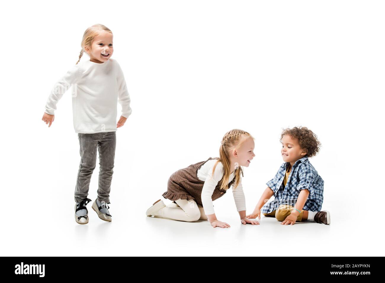 Happy blonde children playing together Cut Out Stock Images & Pictures ...