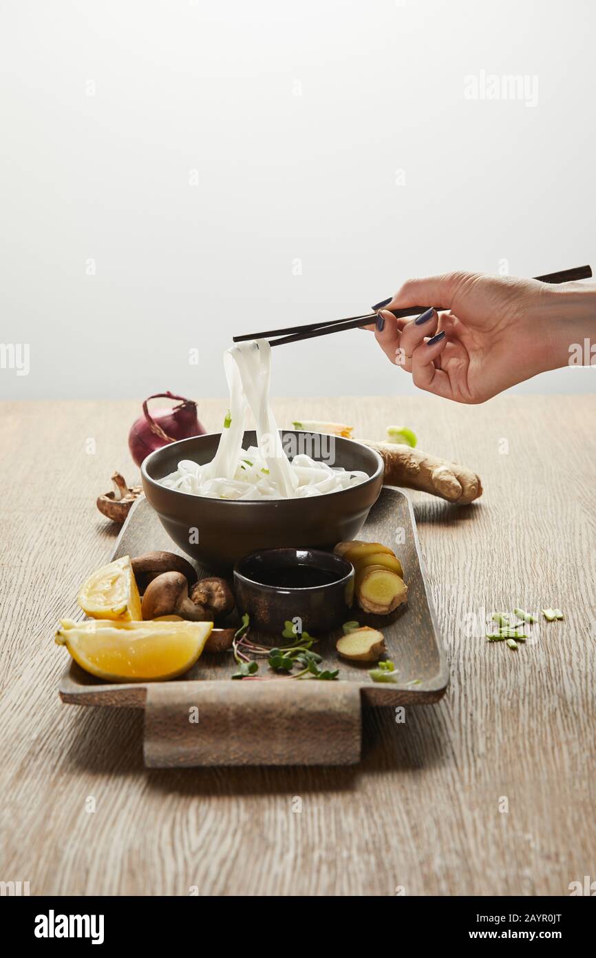 Chinese woman cooking noodles hi-res stock photography and images - Alamy