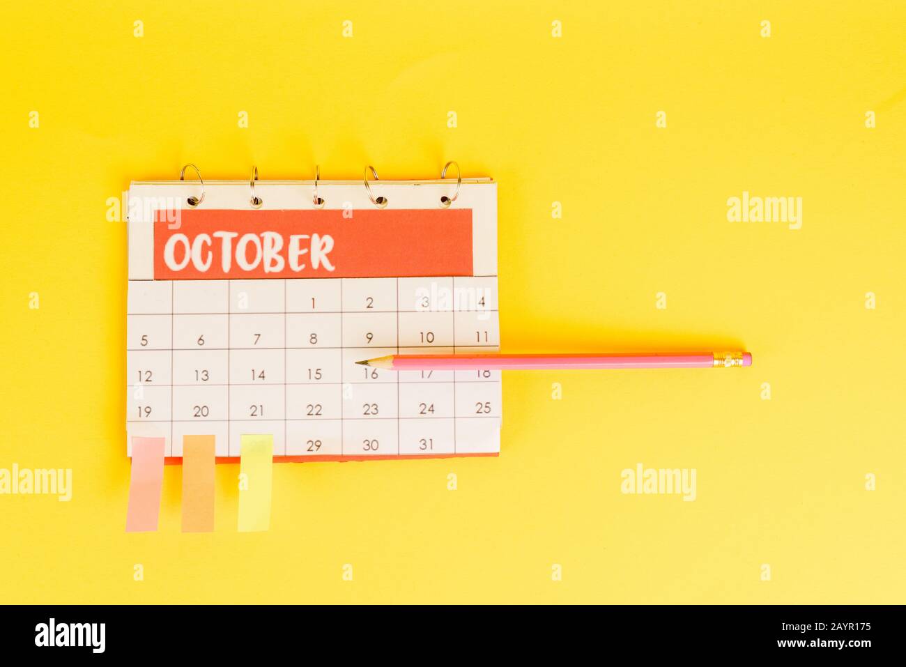 Top view of pencil on calendar with november month and sticky notes on ...