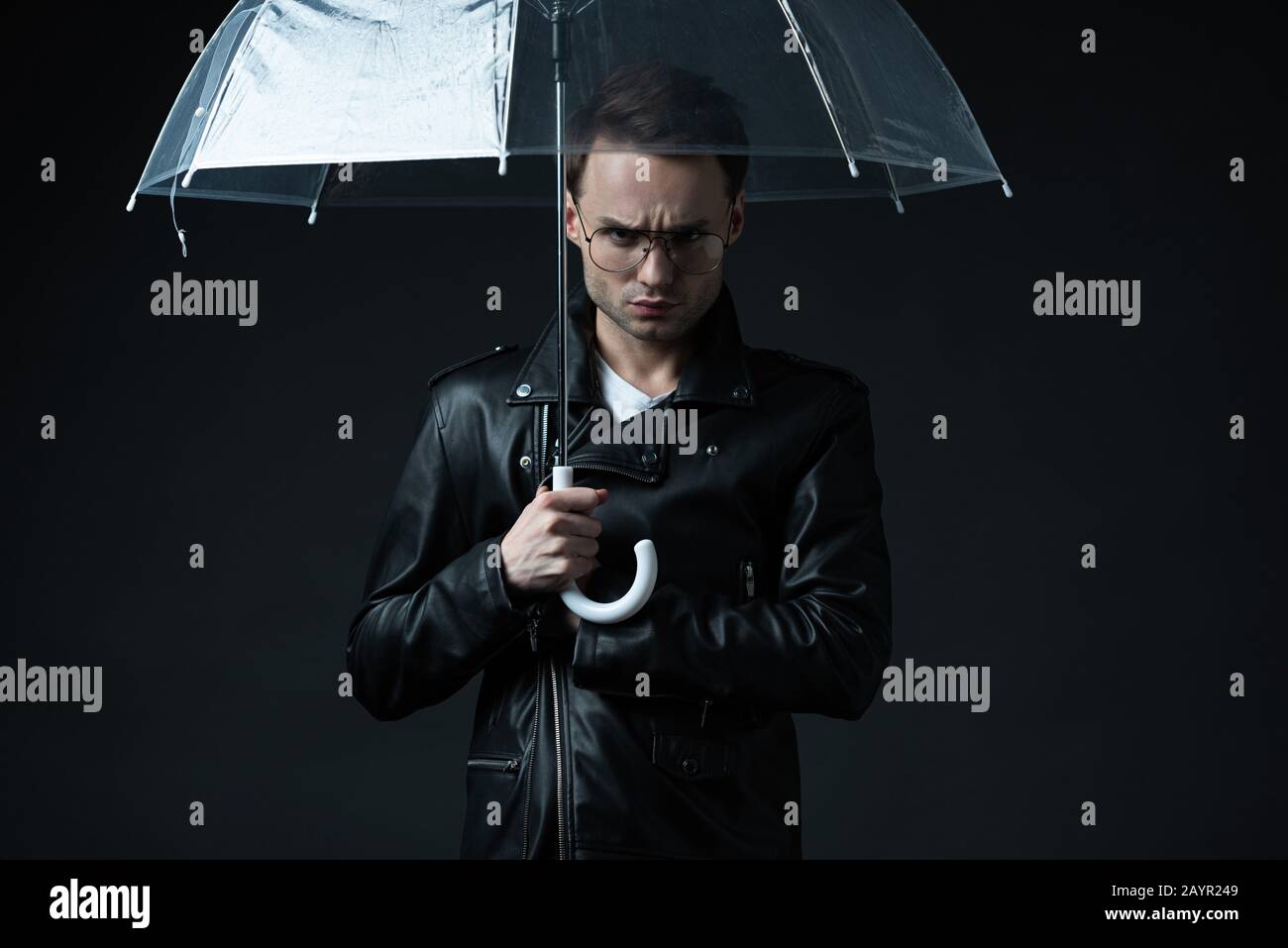 Man in the rain angry hi-res stock photography and images - Alamy