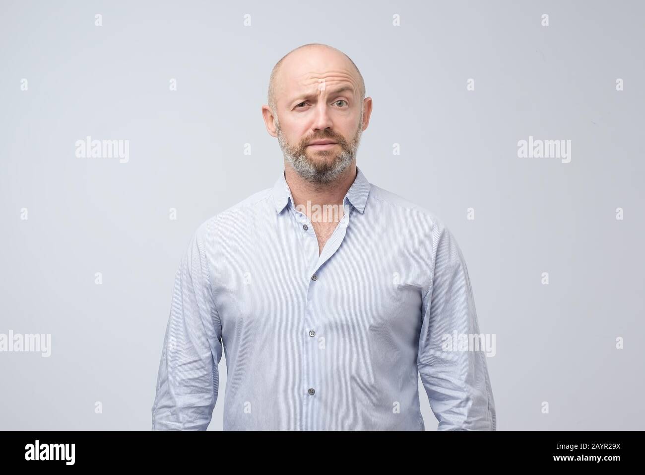 Doubt, mistrust, distrust concept. Doubtful man looking with disbelief ...