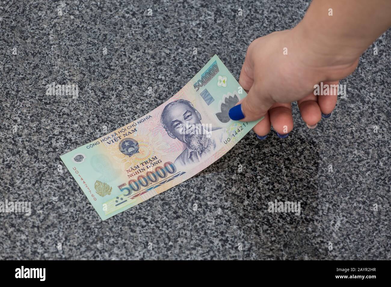 Found a piece of 50000 dong money note on the floor Stock Photo - Alamy