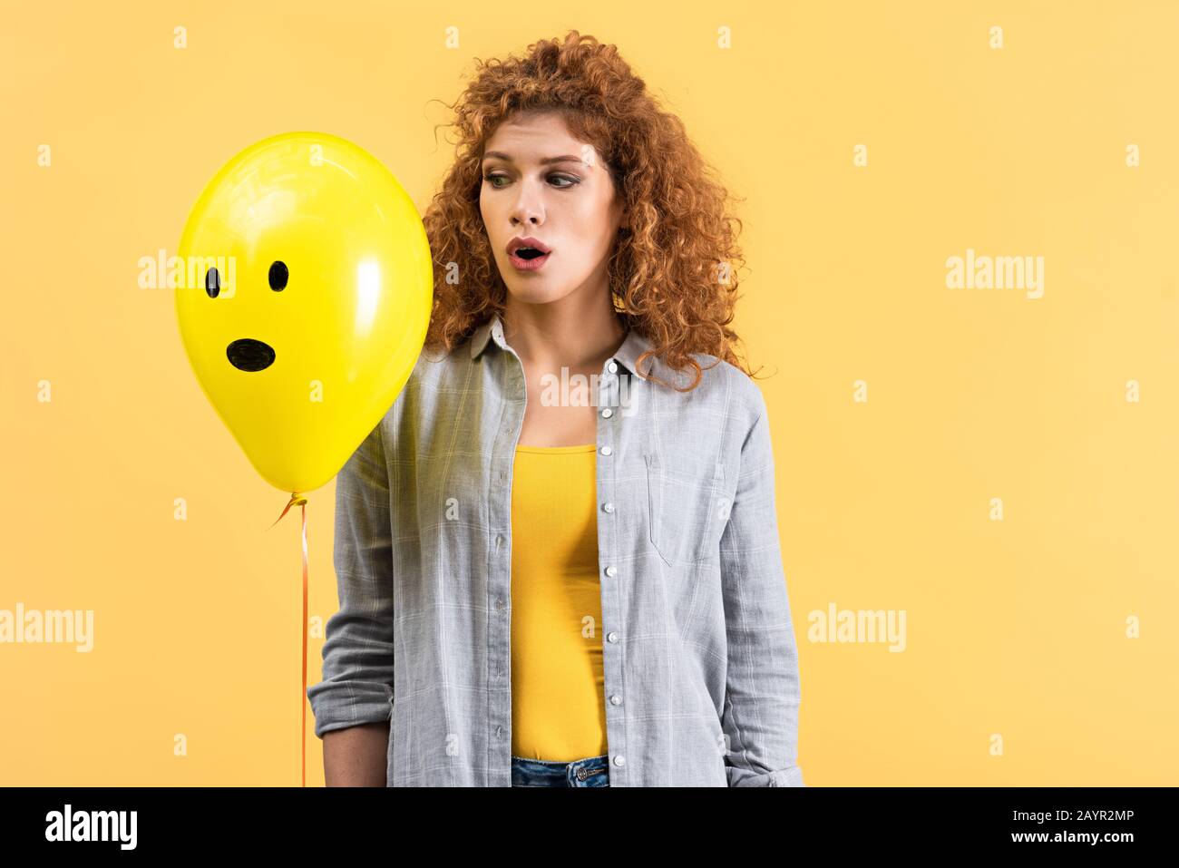 Shocked face woman balloon hi-res stock photography and images - Alamy