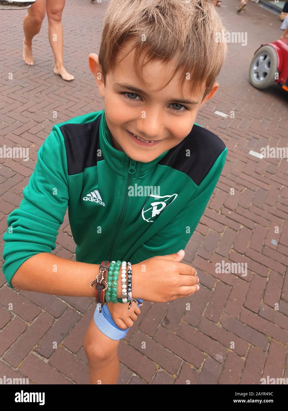 One arm child hi-res stock photography and images - Alamy