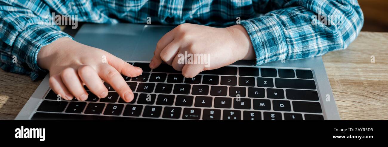 Boy typing hi-res stock photography and images - Alamy