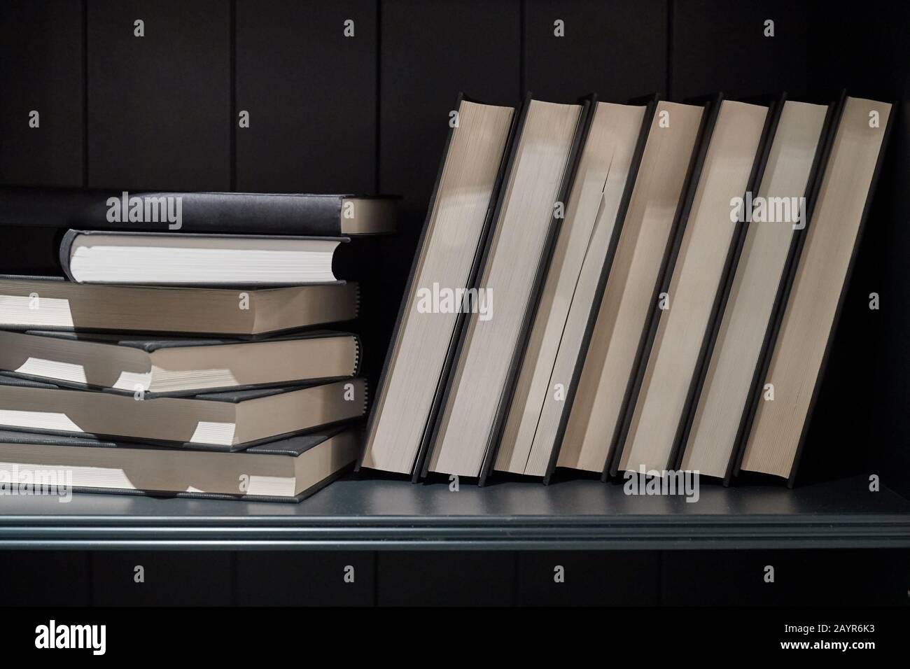 Books on a shelf Stock Photo - Alamy