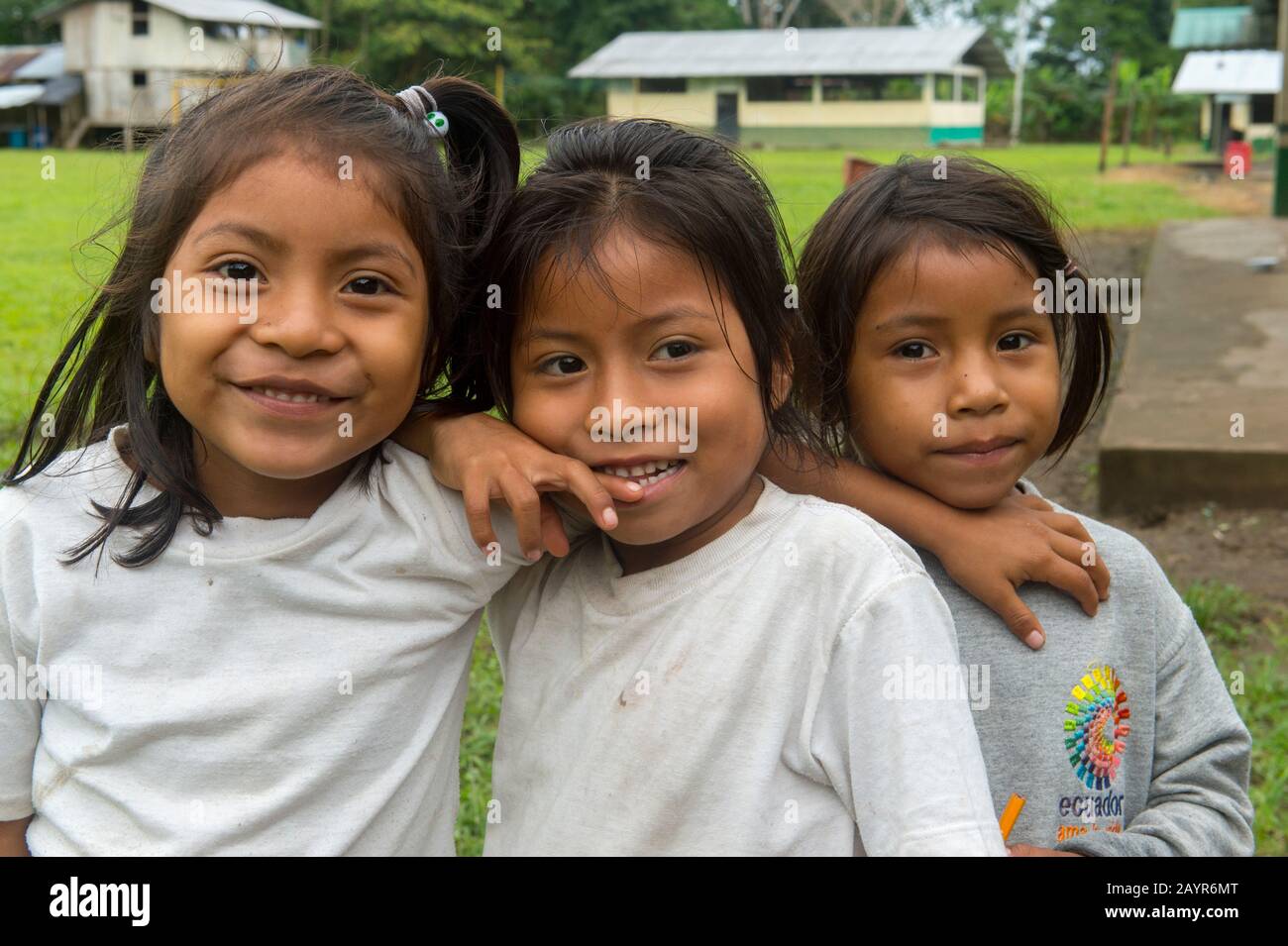 Portrait of three Kichwa native girls at the native community O El ...