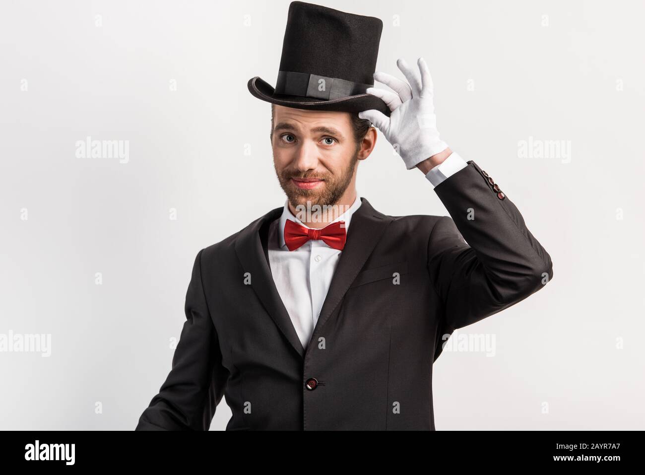 Adjusting hat hi-res stock photography and images - Alamy